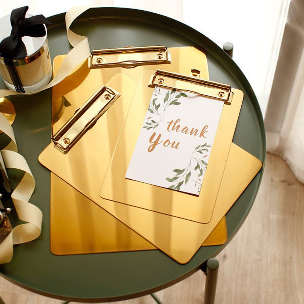 Confidora - Elegantes goldenes Metall-Klemmbrett – Hauser Berlin